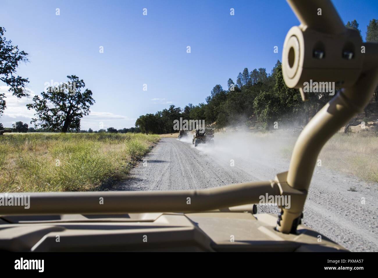 U.S. Army Soldiers drive Polaris RZRs to various Tactical Assembly ...