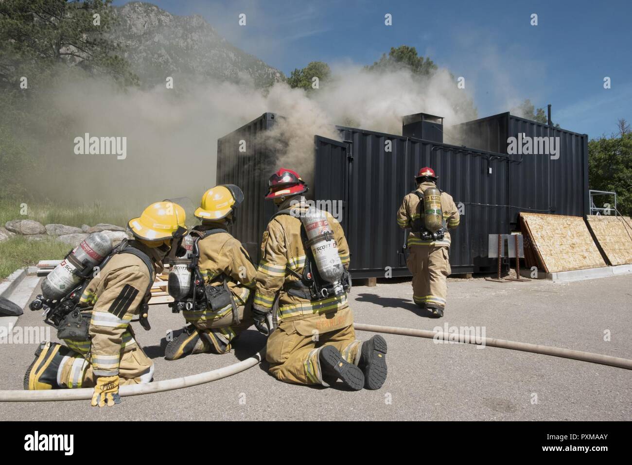 CHEYENNE MOUNTAIN AIR FORCE STATION, Colo. – Firefighters from the ...