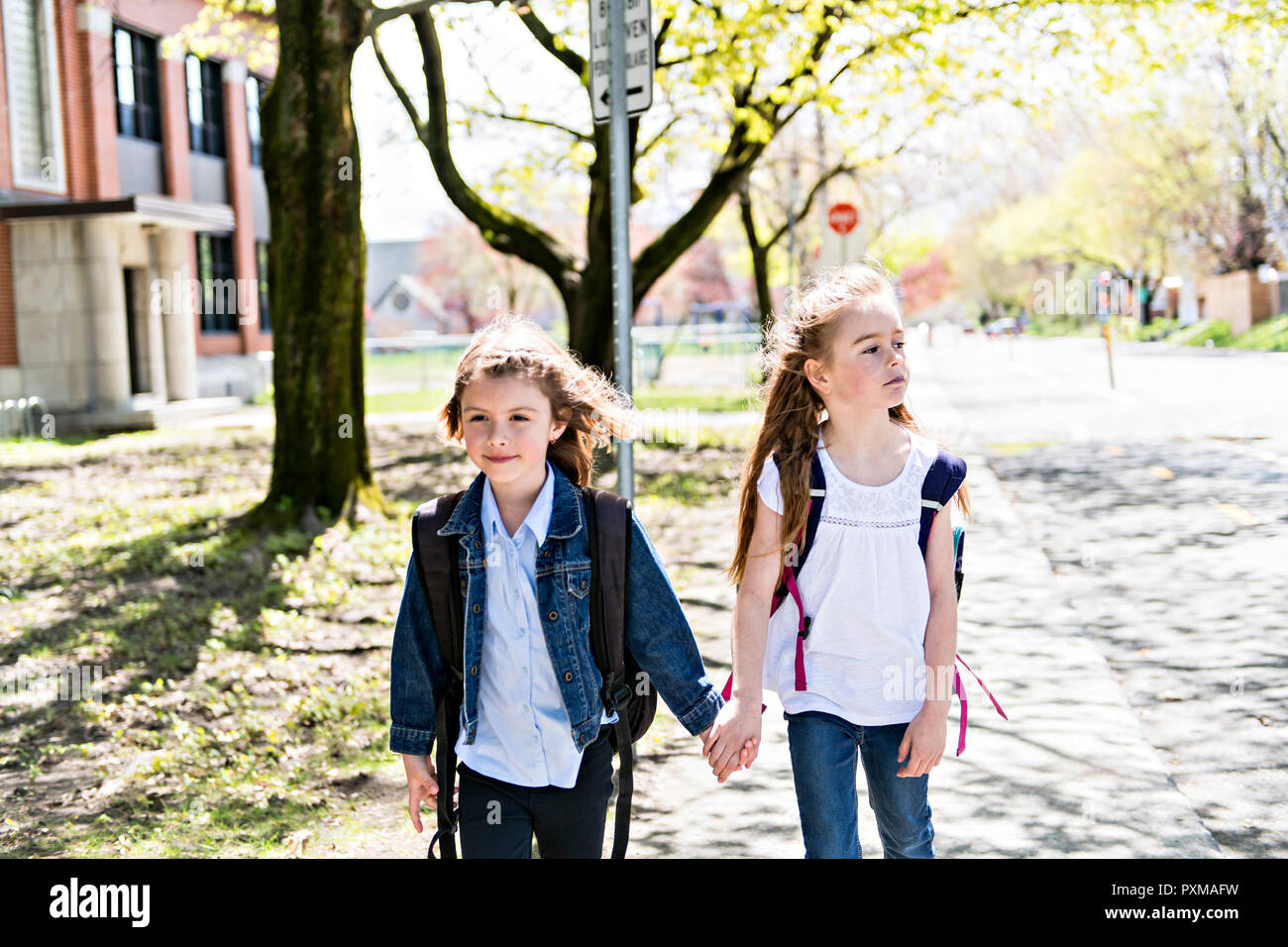 A group of Two students outside at school standing together Stock Photo ...