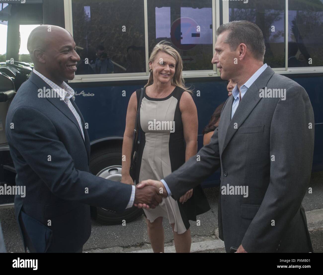 Chief Master Sgt. of the Air Force Kaleth O. Wright (left) shakes hands ...