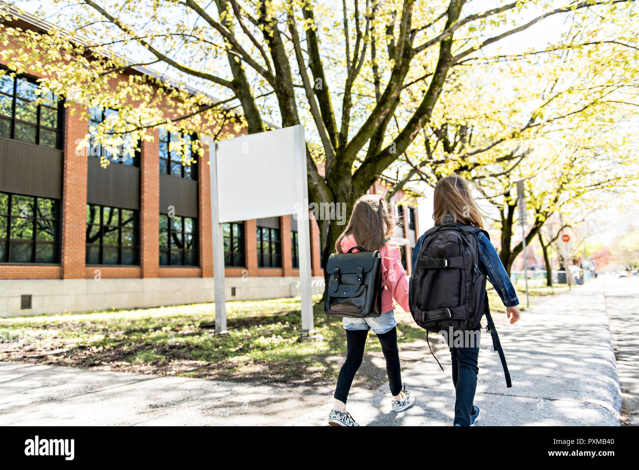 A group of Two students outside at school standing together Stock Photo ...