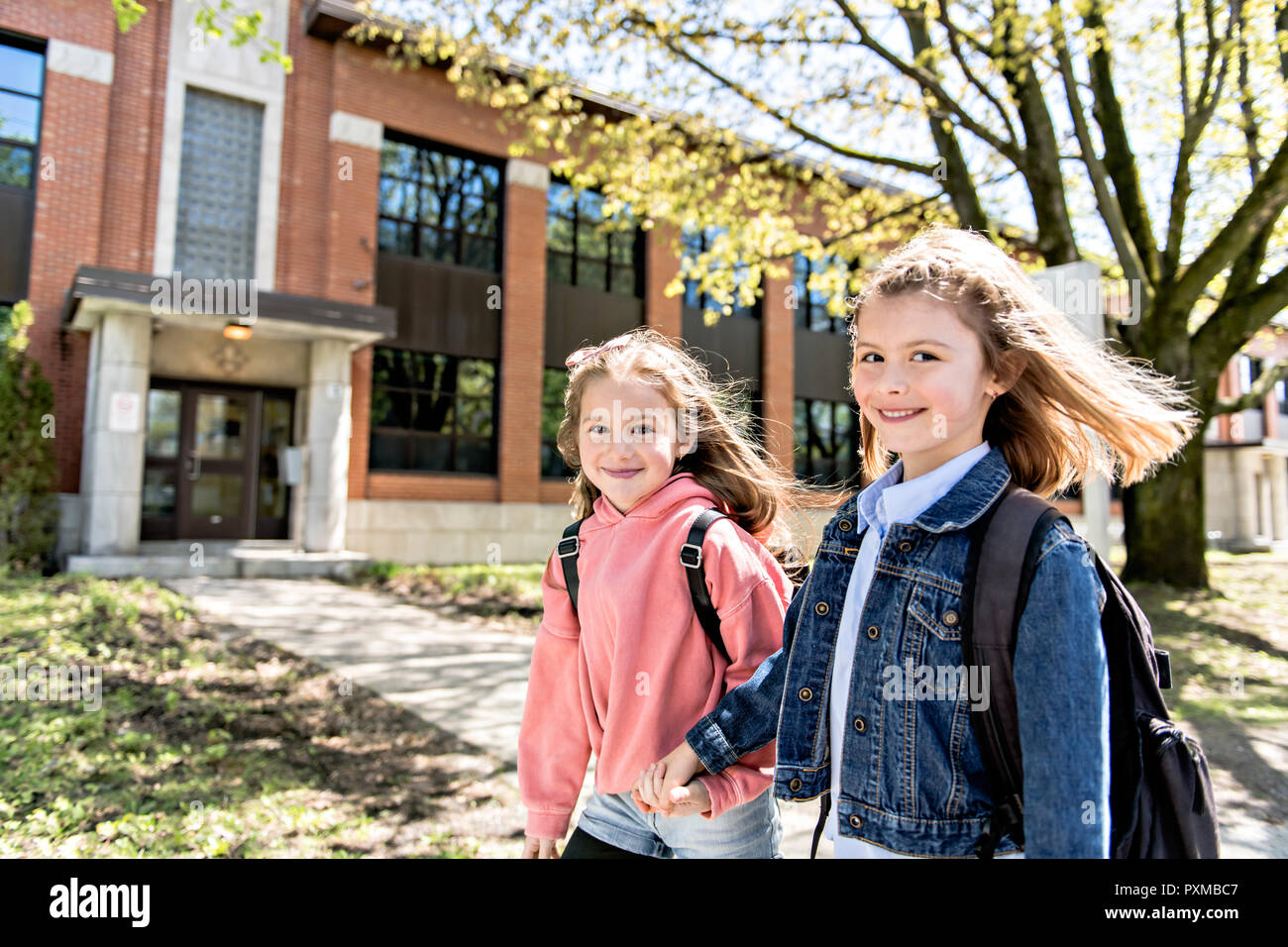 A group of Two students outside at school standing together Stock Photo ...