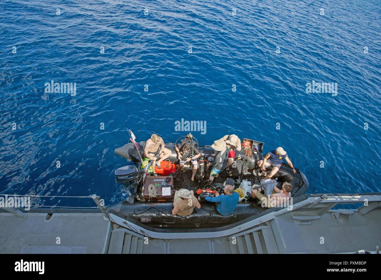 Members of the Royal Canadian Navy Fleet Diving Unit prepare to depart ...