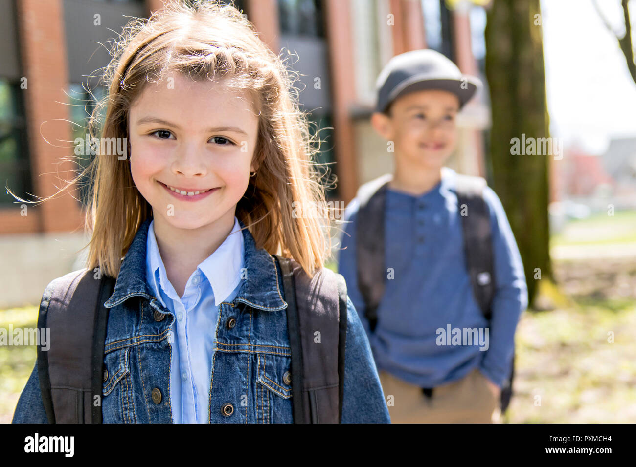 A group of Two students outside at school standing together Stock Photo ...