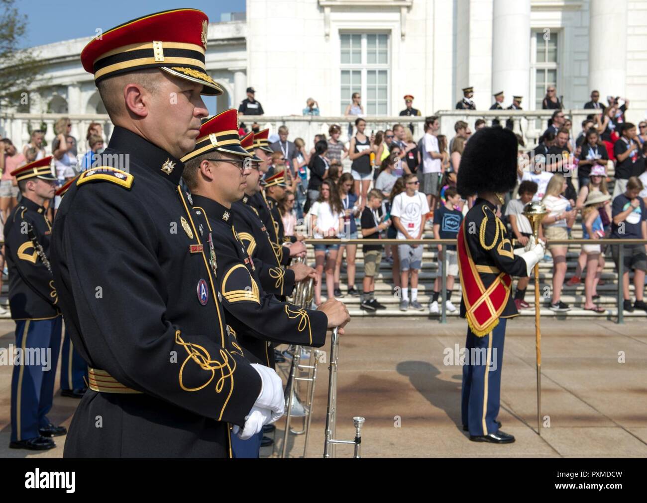 Members of The United States Army Band “Pershing’s Own,” stand ready ...