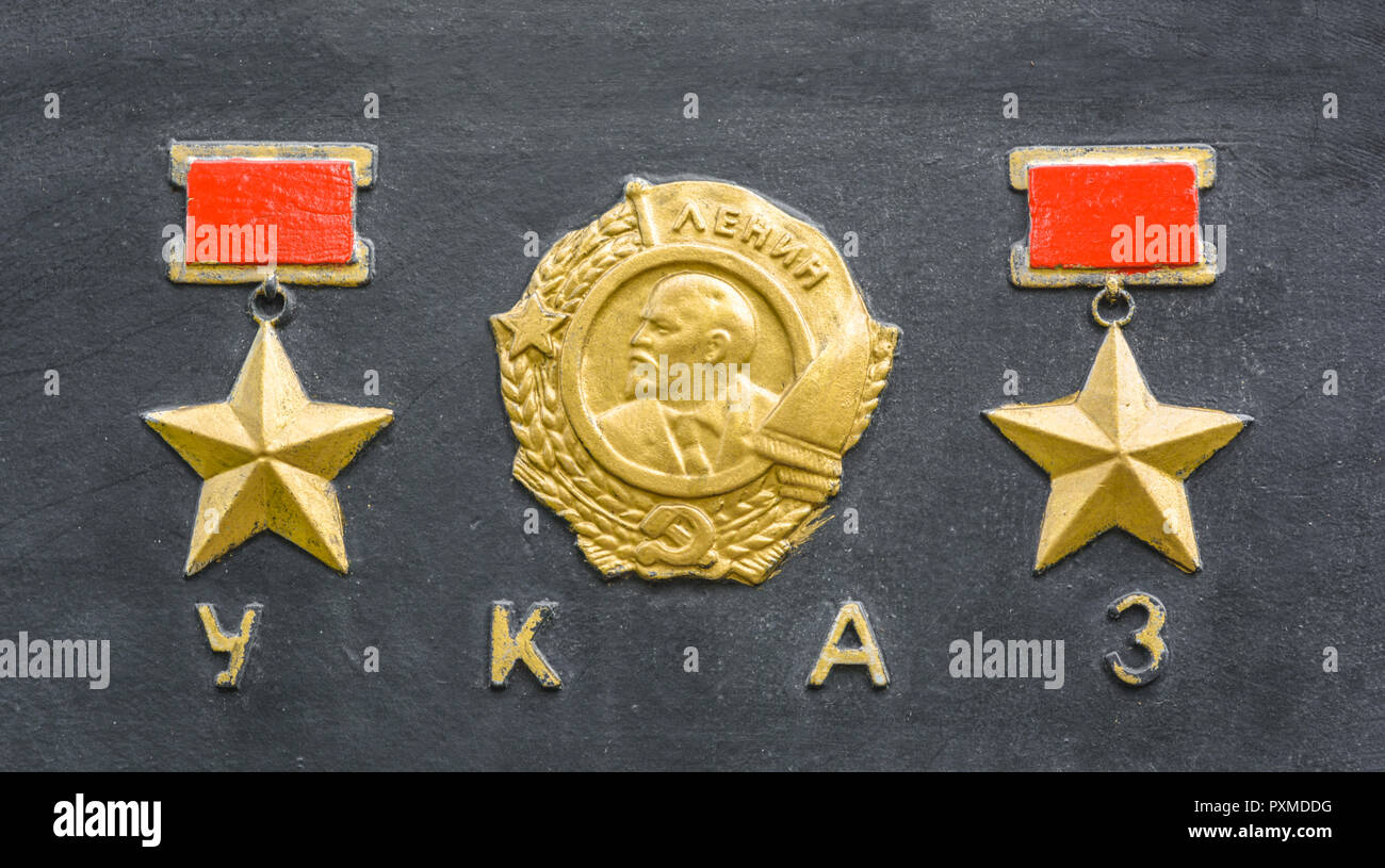 Signs of Order Hero of Soviet Union Gold Star and emblem with portrait ...