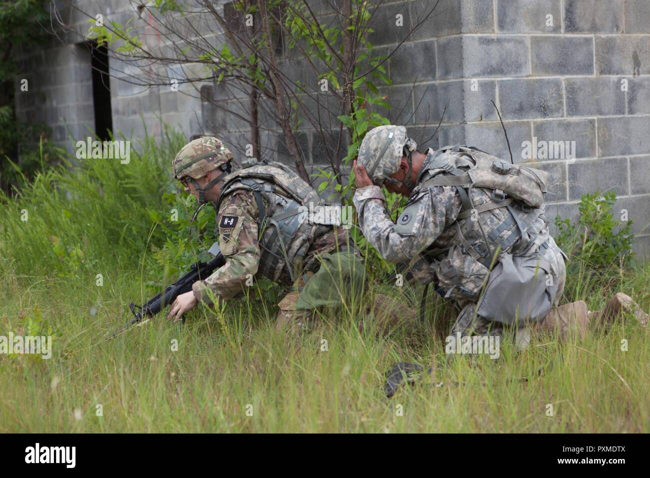 Sgt. Alexander Dennis of the 76th Operational Response Command (left ...