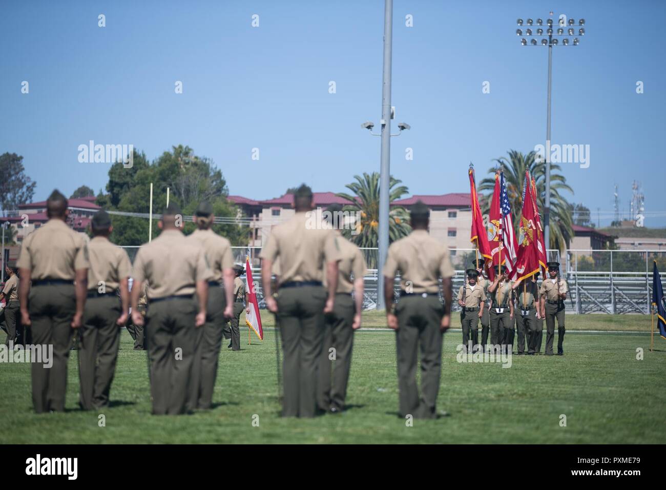 U.S. Marine SgtMaj. Carlos A. Ruiz (right) exchanges the Regimental ...