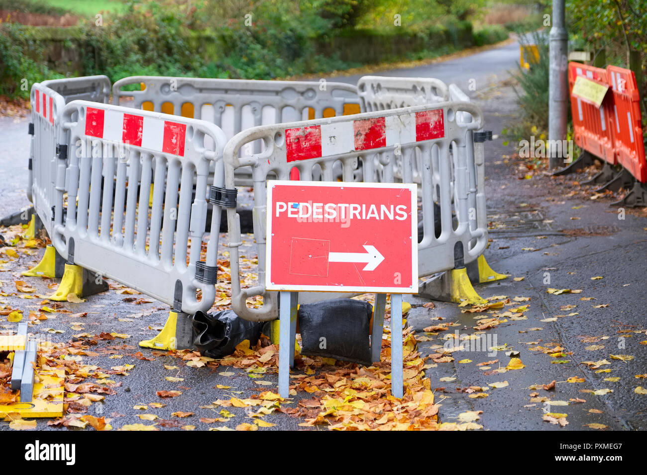 Footpath closed sign for pedestrian safety from road construction on ...