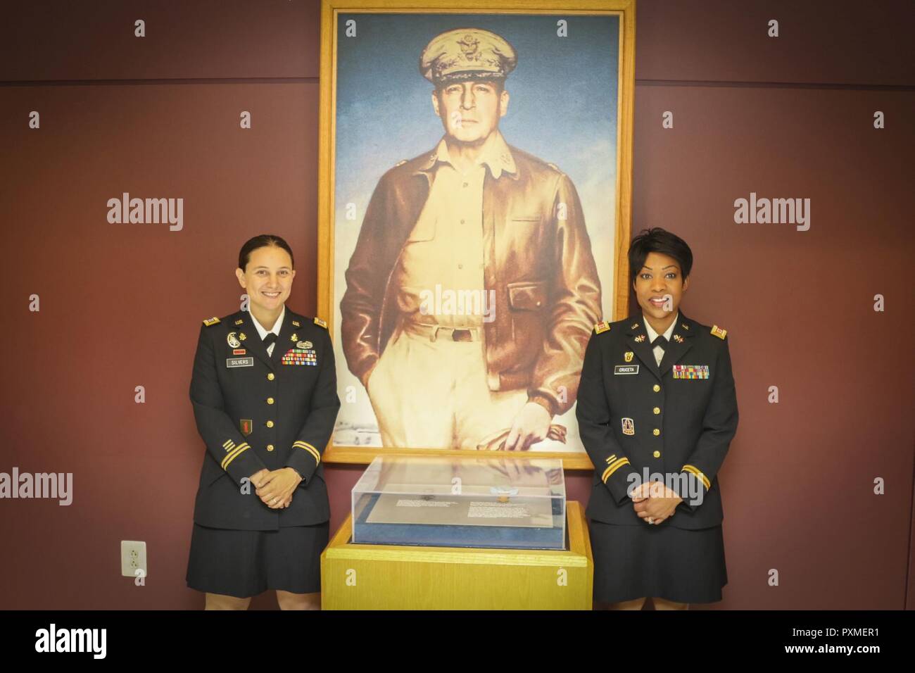 Capt. Amanda Silvers (left), officer-in-charge of mobilization, 335th ...
