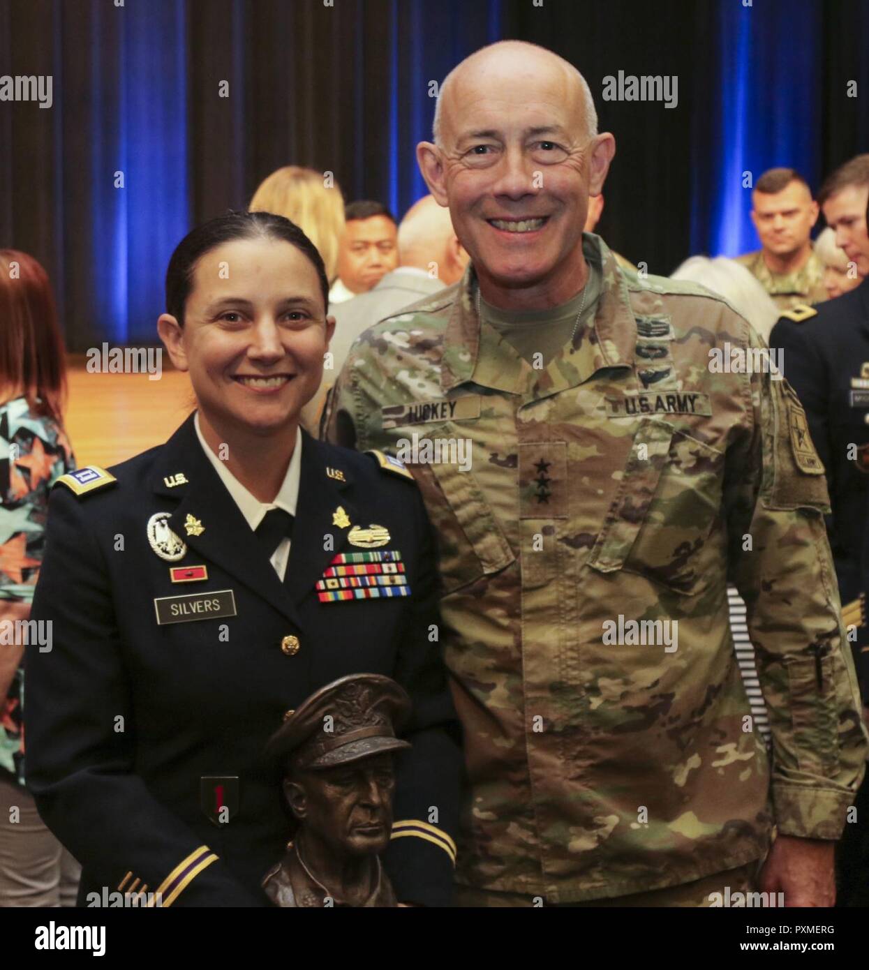 Capt. Amanda Silvers (left), officer-in-charge of mobilization, 335th ...