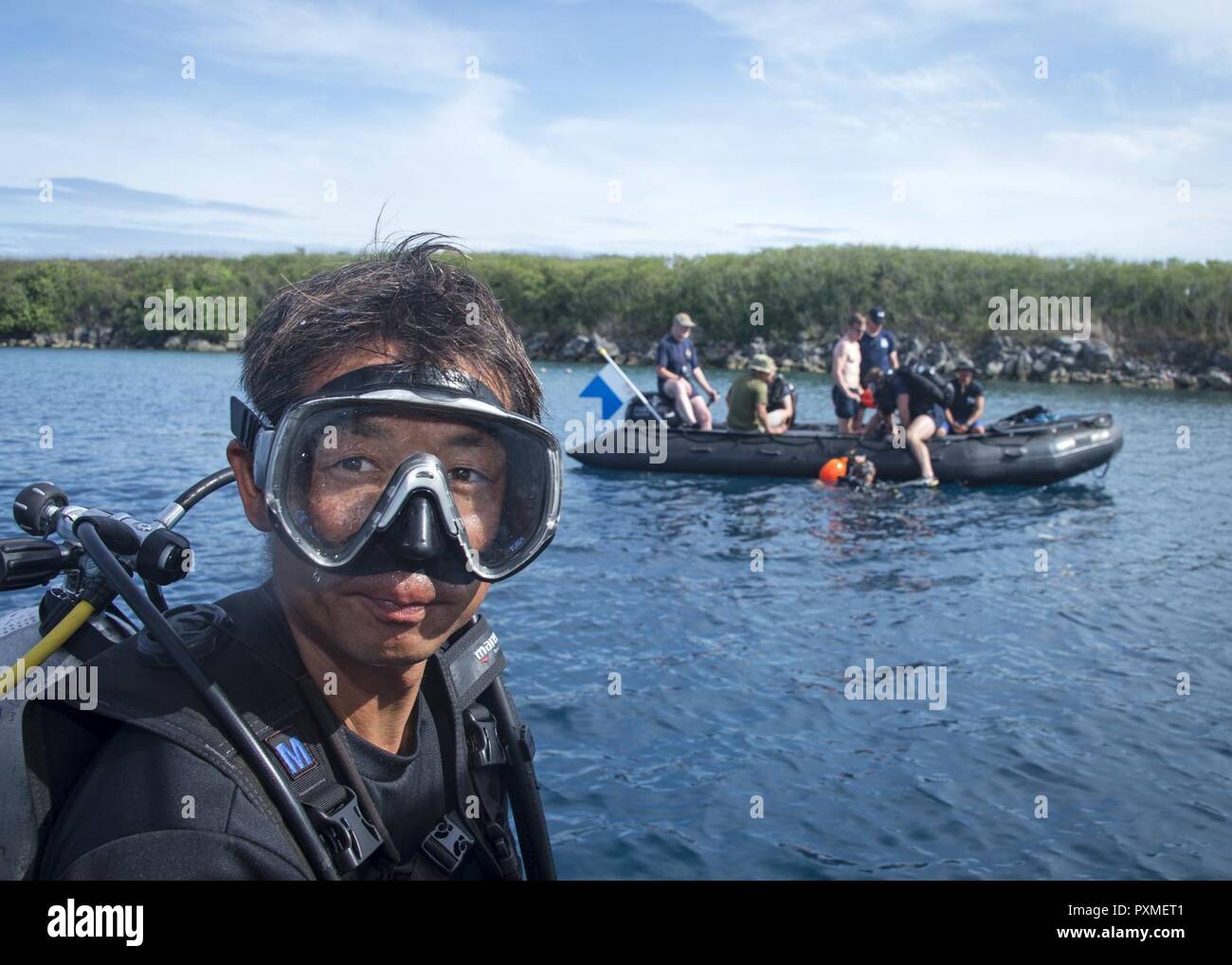A member of the Japan Maritime Self Defense Force prepares for a dive ...