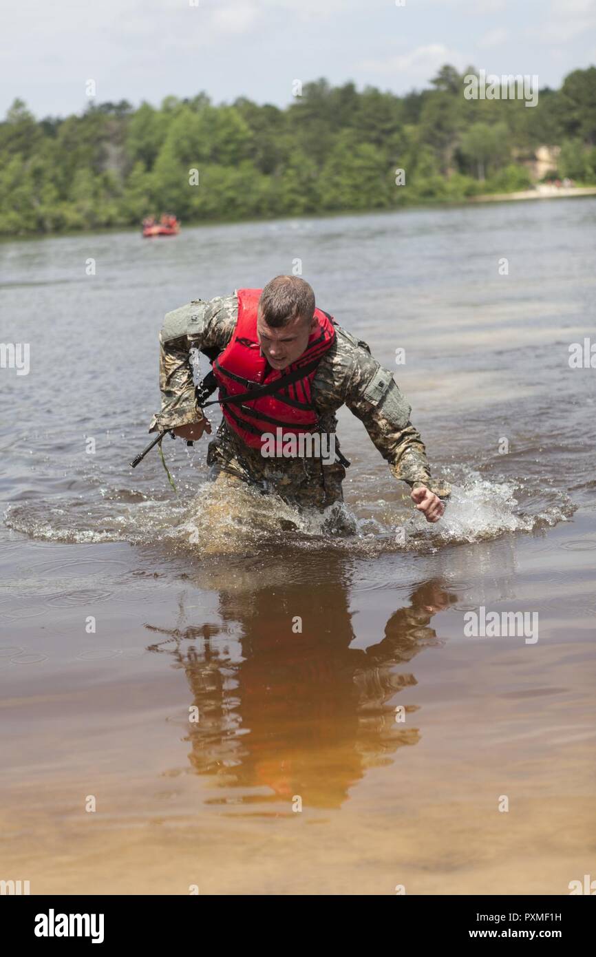 Sgt. Benjamin Poulin, 824th Transportation Company, finishes a 300 ...