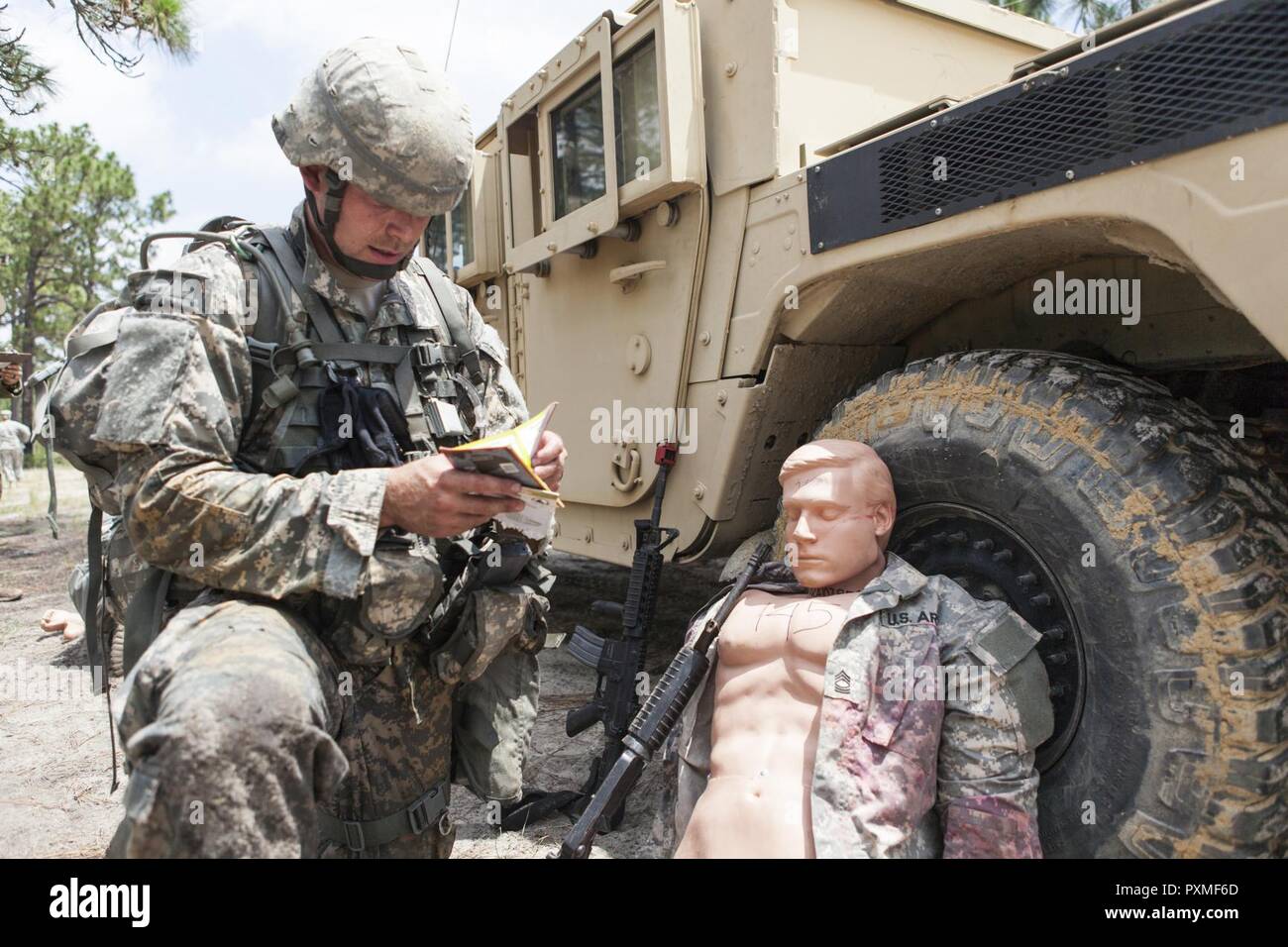 Sgt. Benjamin Poulin, 824th Transportation Company, prepares to call a ...