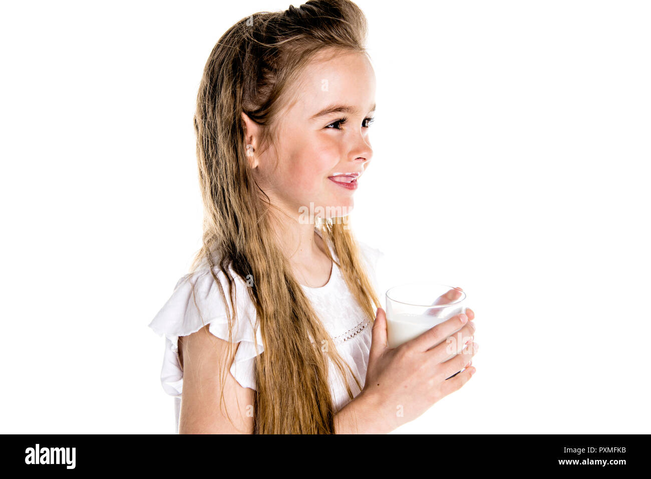 A Portrait of a cute 7 years old girl Isolated over white background ...