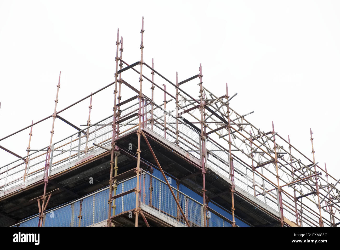 Scaffold high erected at building construction site white clear sky ...