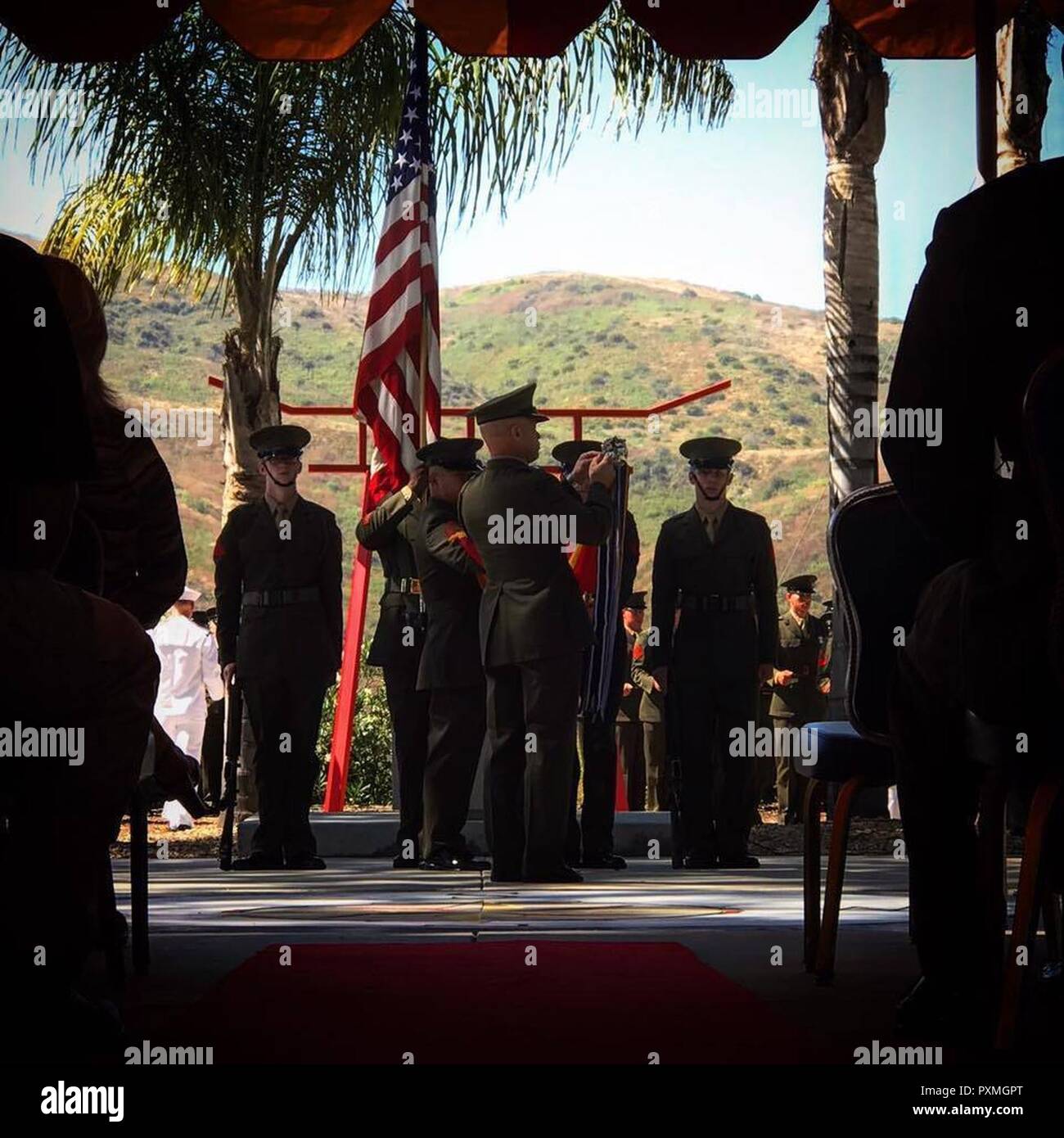 U.S. Marines with 5th Marine Regiment hold the regimental ribbons ...