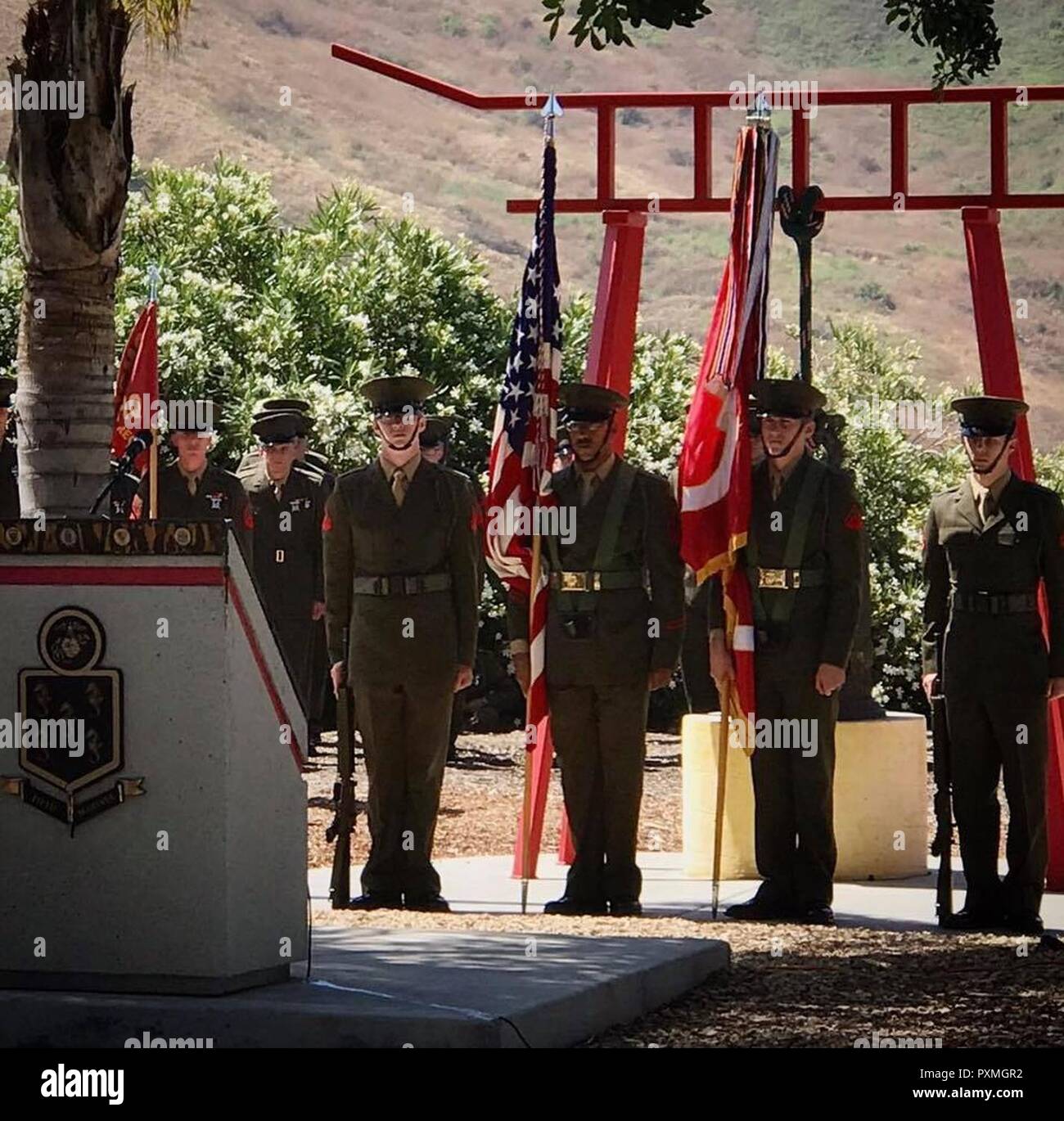 U.S. Marines with 5th Marine Regiment hold the regimental ribbons ...