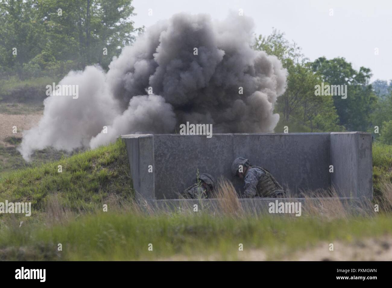 U.S. Army Spc. Jody Fabian, left, and Staff Sgt. David Hart, right ...