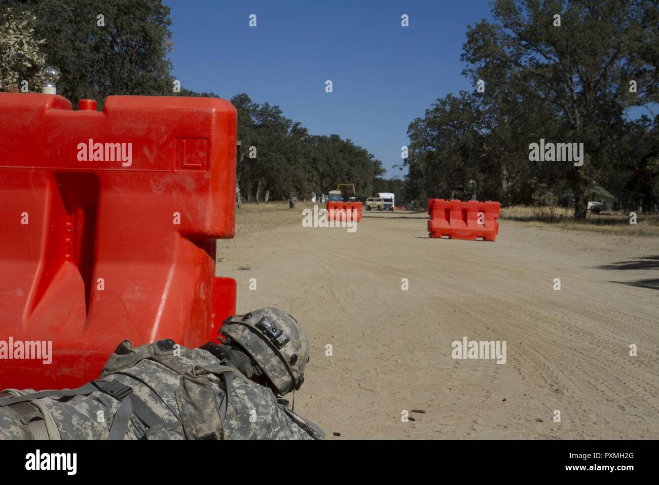 U.S. Army Pvt. Charly Ubaldo takes a defensive fighting position during ...