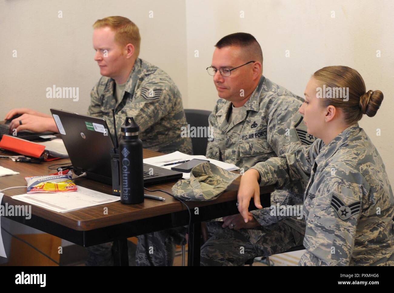 Oregon Air National Guard Senior Airman Randi Jenkins (right), assigned ...