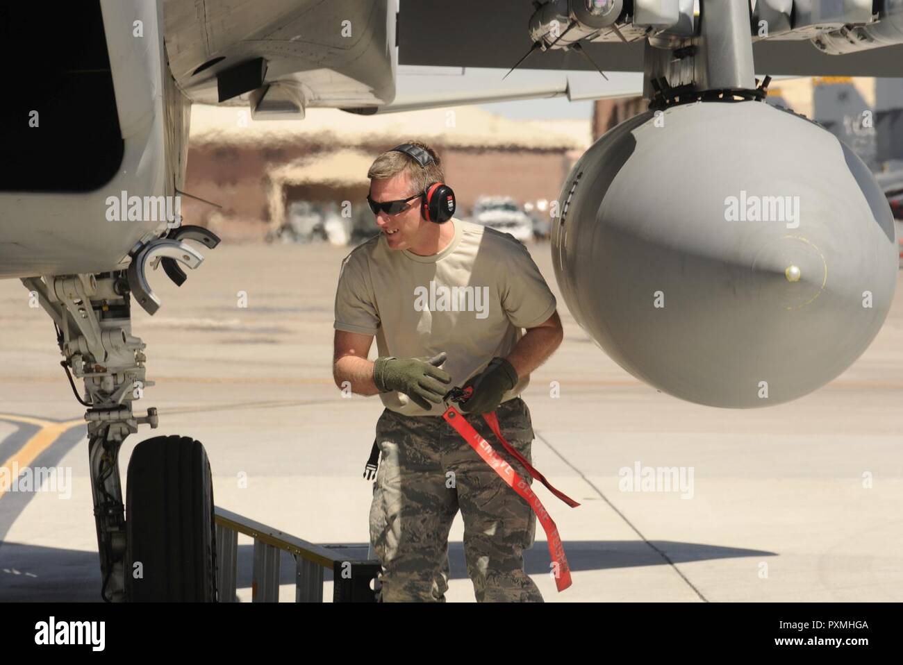 Oregon Air National Guard Staff Sgt. Ken Griffin prepares an F-15 Eagle ...