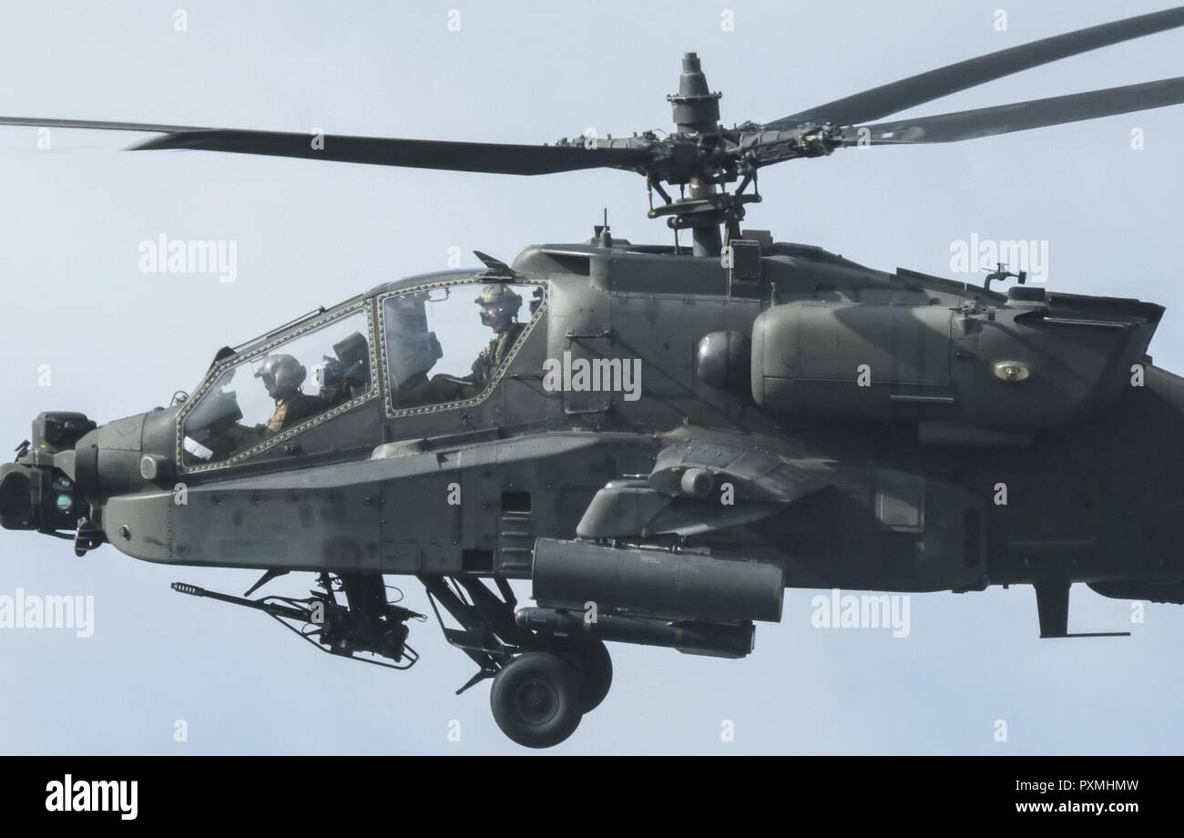 An AH-64 Apache from 3rd Combat Aviation Brigade, 3rd Infantry Division ...