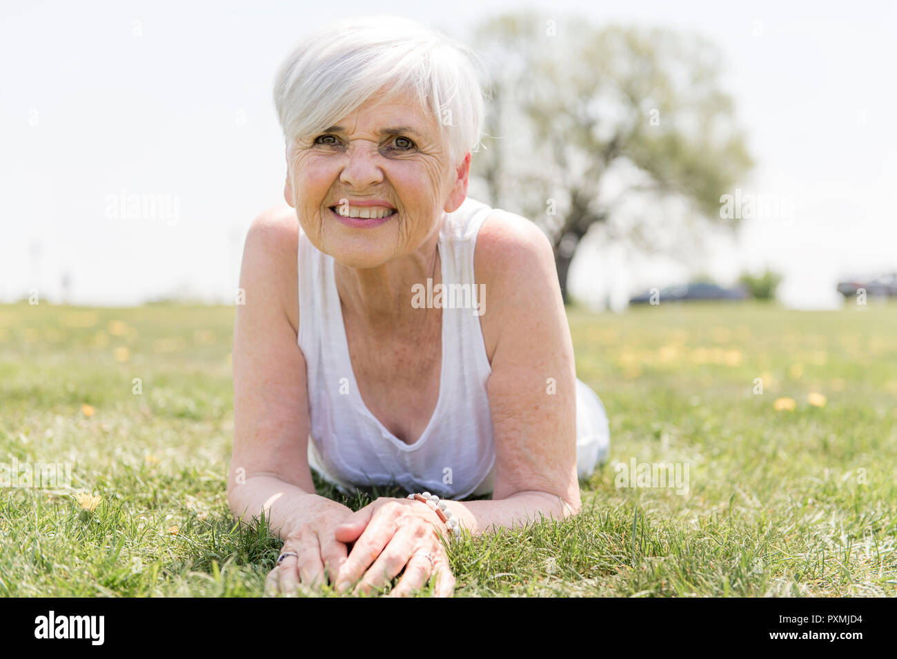 Happy old lady alone hi-res stock photography and images - Alamy