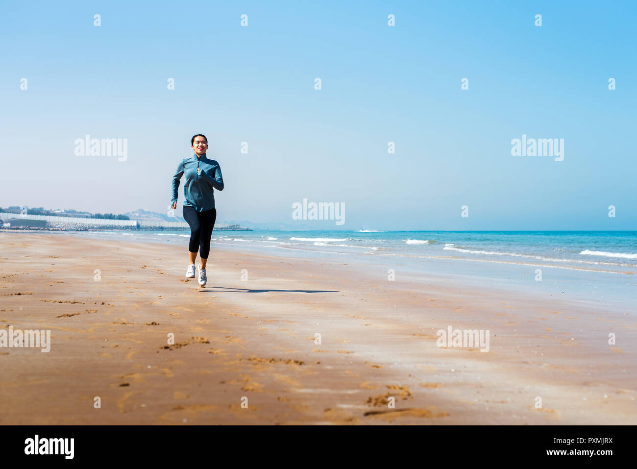Woman running fast exercise hi-res stock photography and images - Alamy