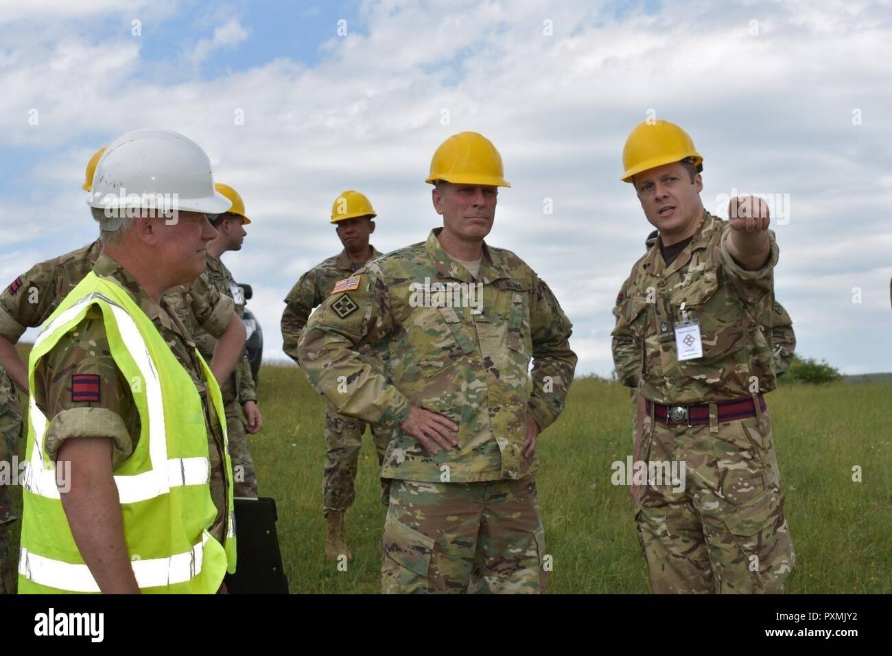 Maj. Gareth Stockman, U.K. Royal Monmouthshire Royal Engineers-Militia, shows Brig. Gen. Phillip ...