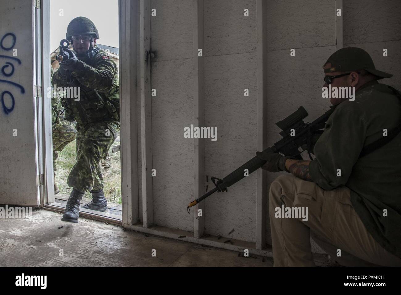 Cpl. Jon Horn of the 3rd Canadian Division, Canadian Army, conducts a ...