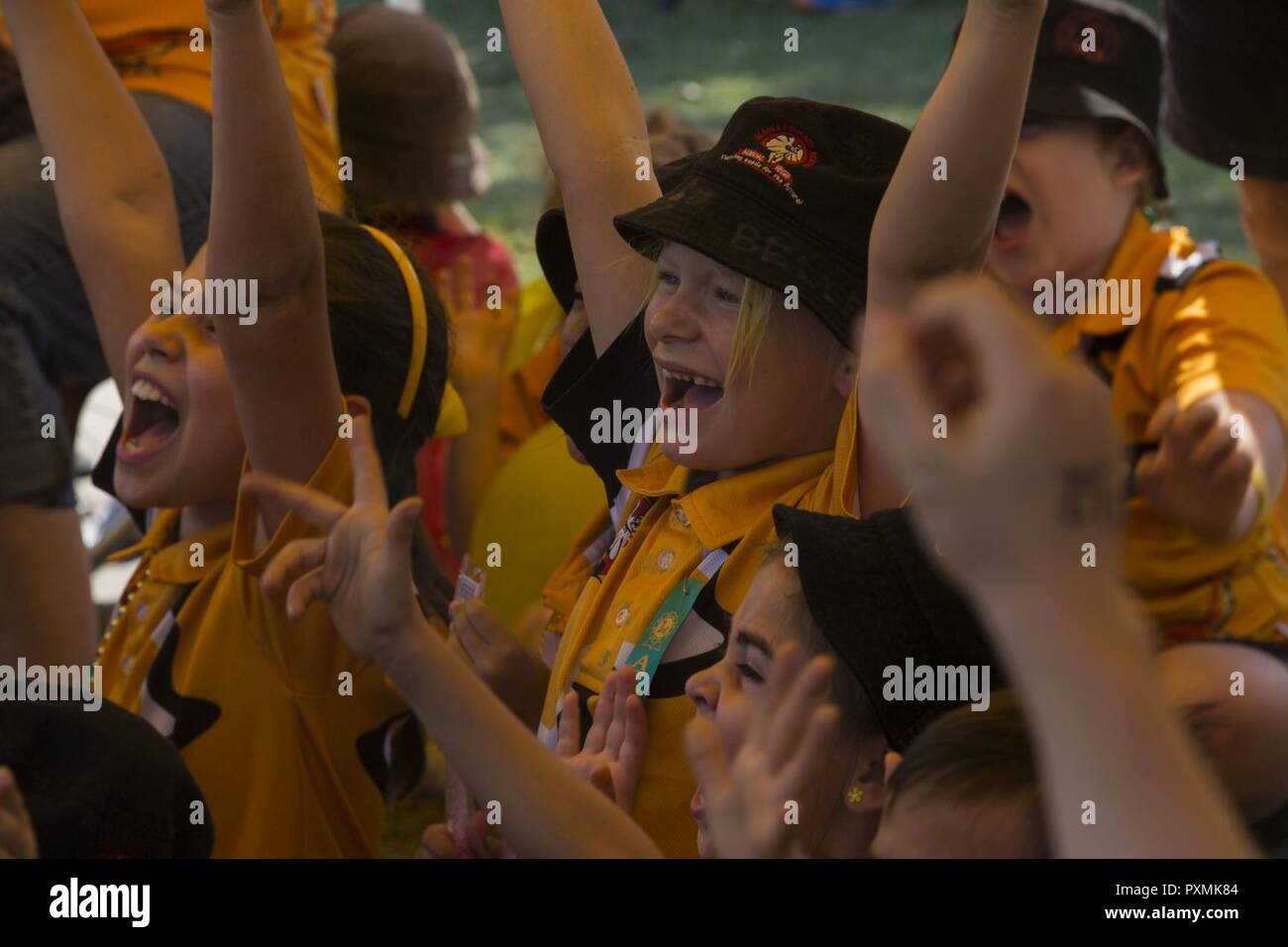 DARWIN, Australia – Students from Alawa Primary School cheer on their ...