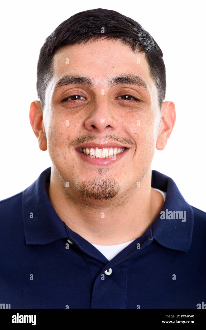 Face of young happy Hispanic man smiling Stock Photo - Alamy