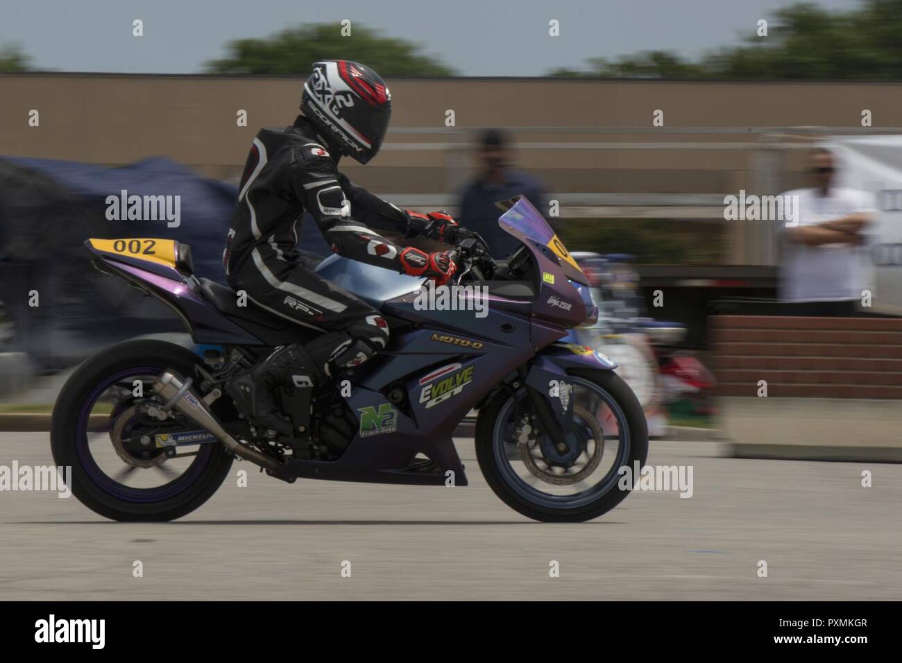 Will Moore, professional motorcycle racer, demonstrates safety ...