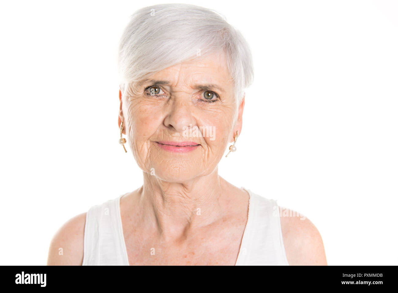elderly woman on studio white background Stock Photo - Alamy