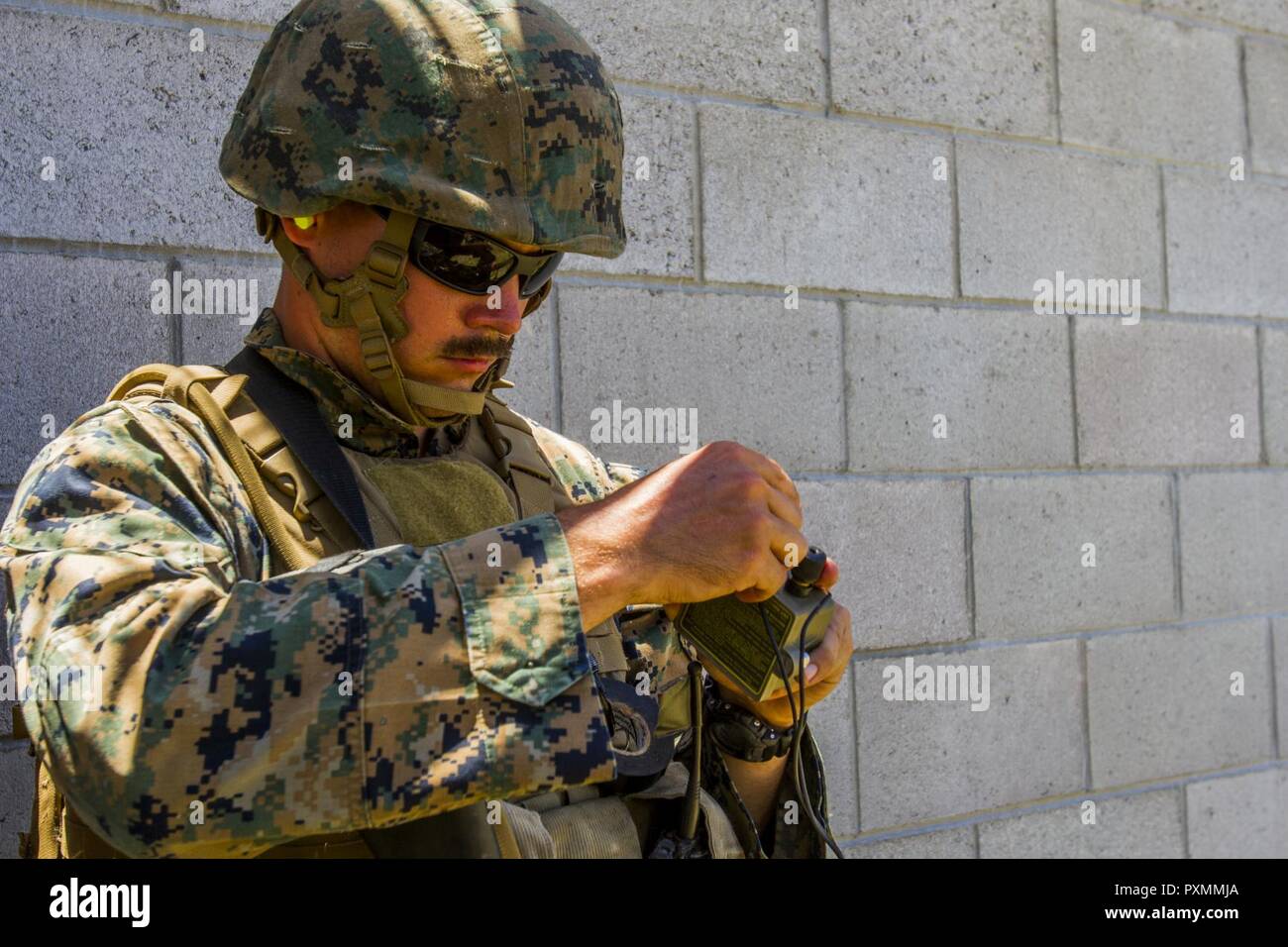 A Marine with 4th Combat Engineers Battalion, 4th Marine Division ...