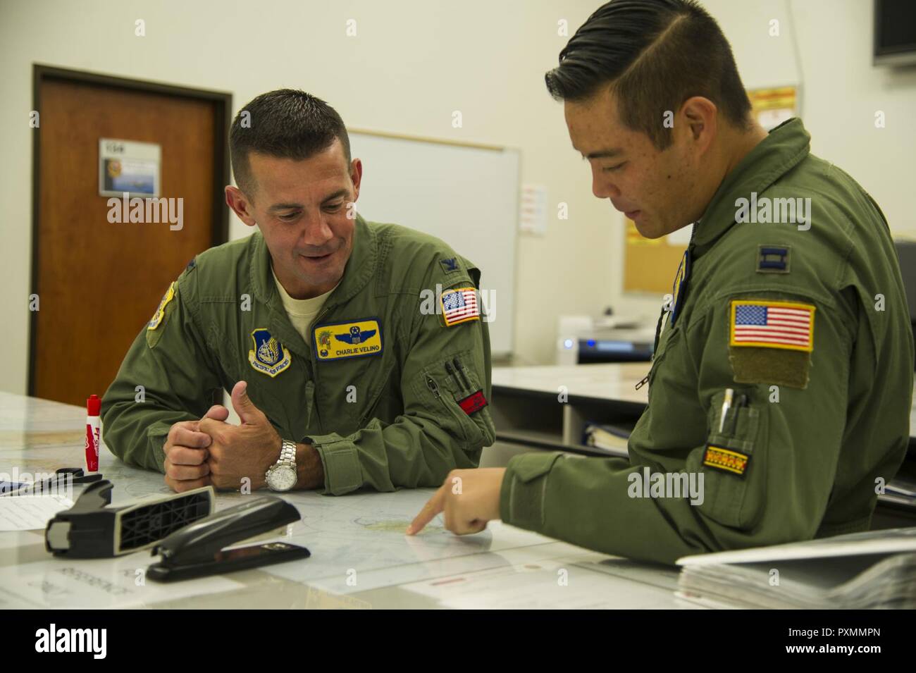 Col. Charles Velino, 15th Operations Group commander, and Capt. Reinier ...