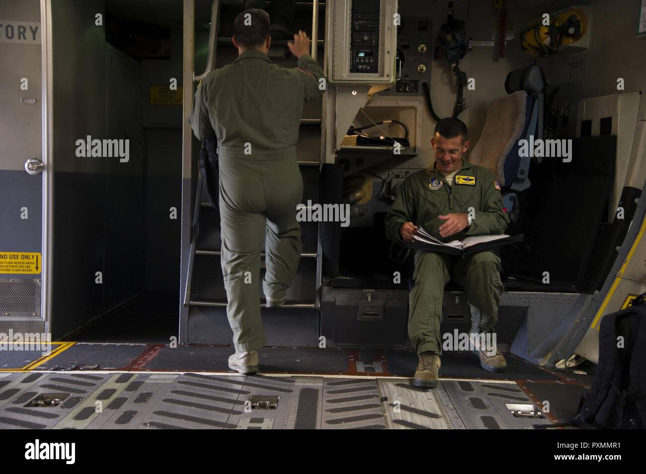 Col. Charles Velino, 15th Operations Group commander, reviews the ...