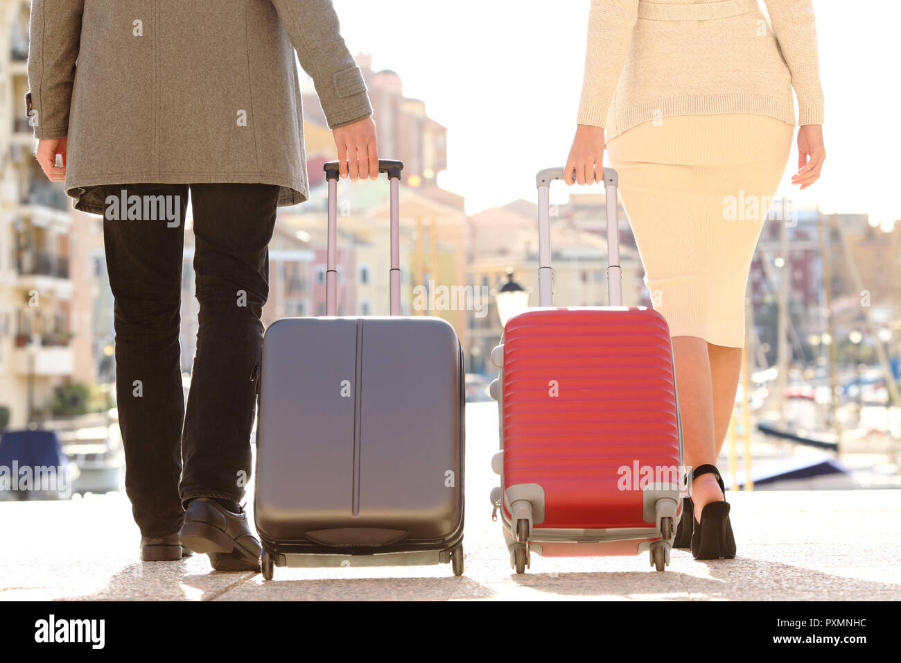 Family with baggage trolleys hi-res stock photography and images - Alamy