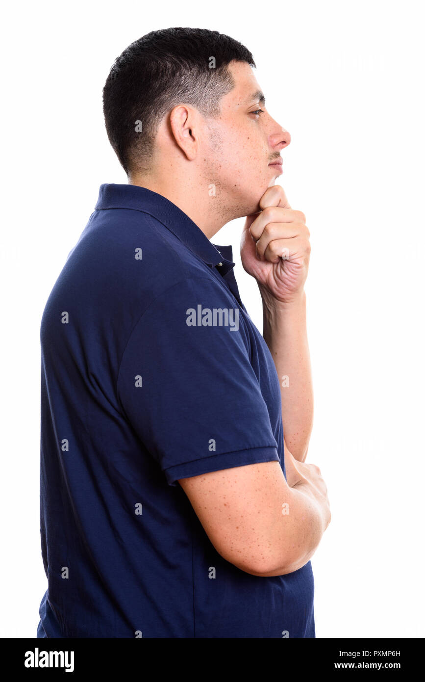 Profile view of young Hispanic man thinking Stock Photo - Alamy