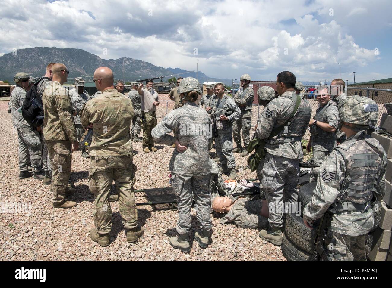 Members from the 233d Space Group rally for an after-actions review after their Self-Aid/Buddy ...