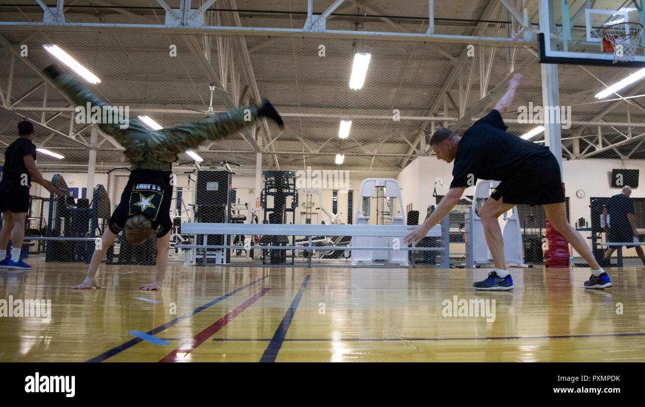 Sgt. Whitney Conder, a Total Soldier Enhancement Training coach ...