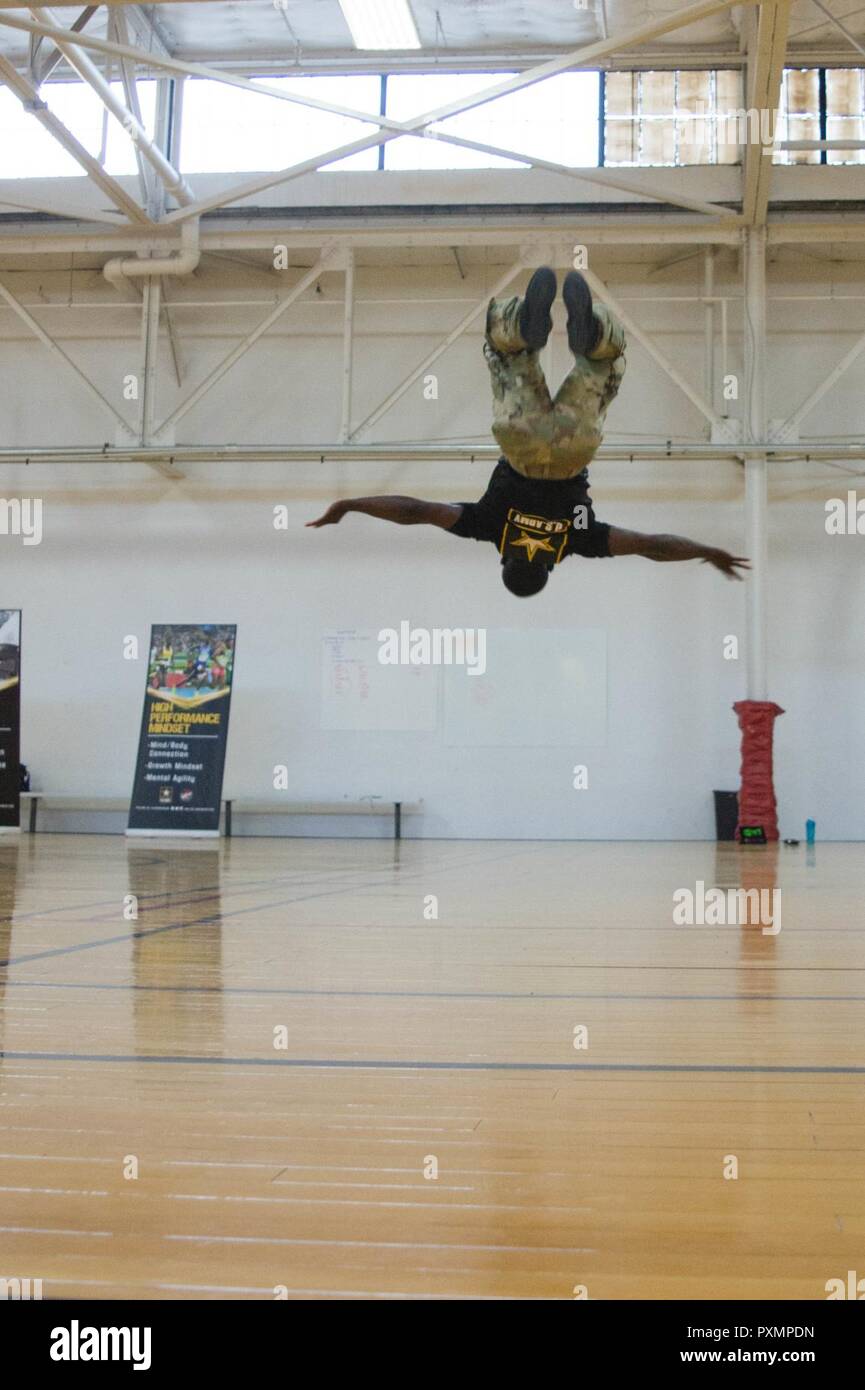 Sgt. Ryan Mango, a Total Soldier Enhancement Training coach ...