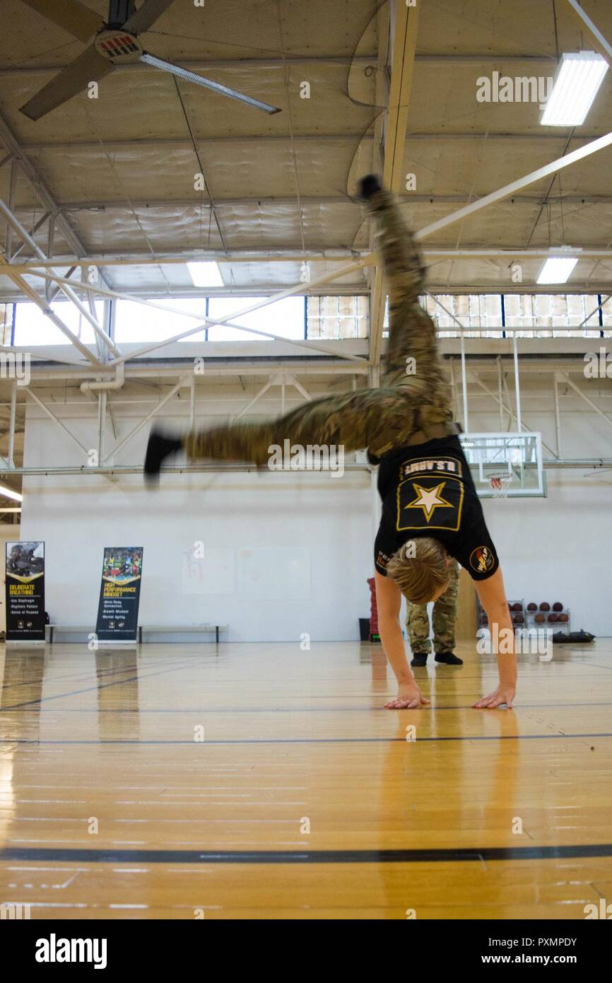 Sgt. Whitney Conder, a Total Soldier Enhancement Training coach ...
