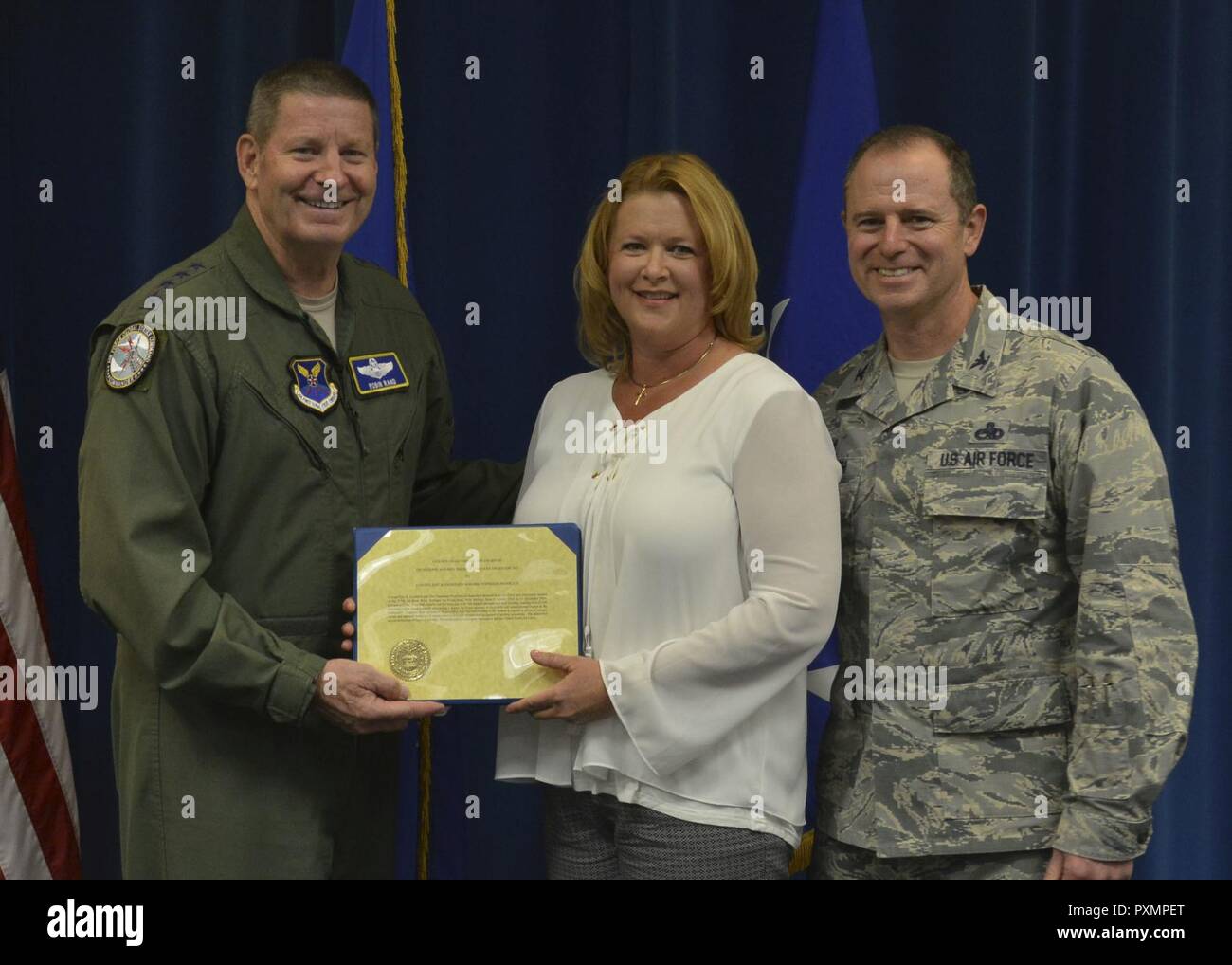 Gen. Robin Rand, Air Force Global Strike Command commander, presents ...