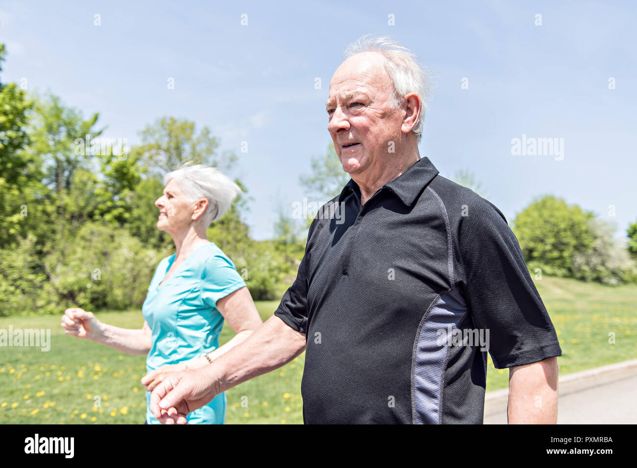 Man woman old running hi-res stock photography and images - Alamy