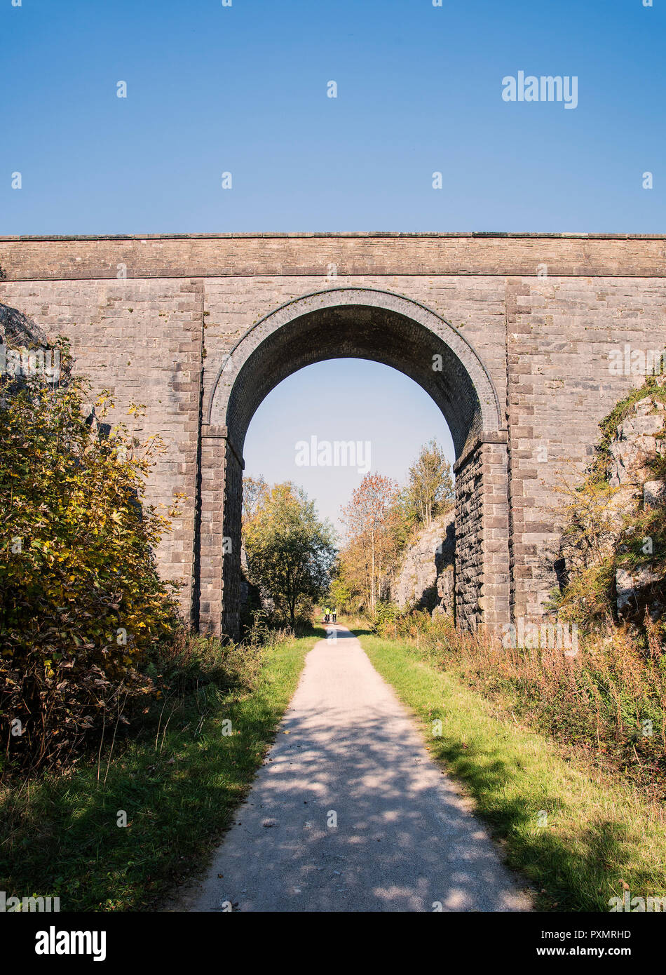 Part of the old Tissington Trail passing under an old bridge just ...