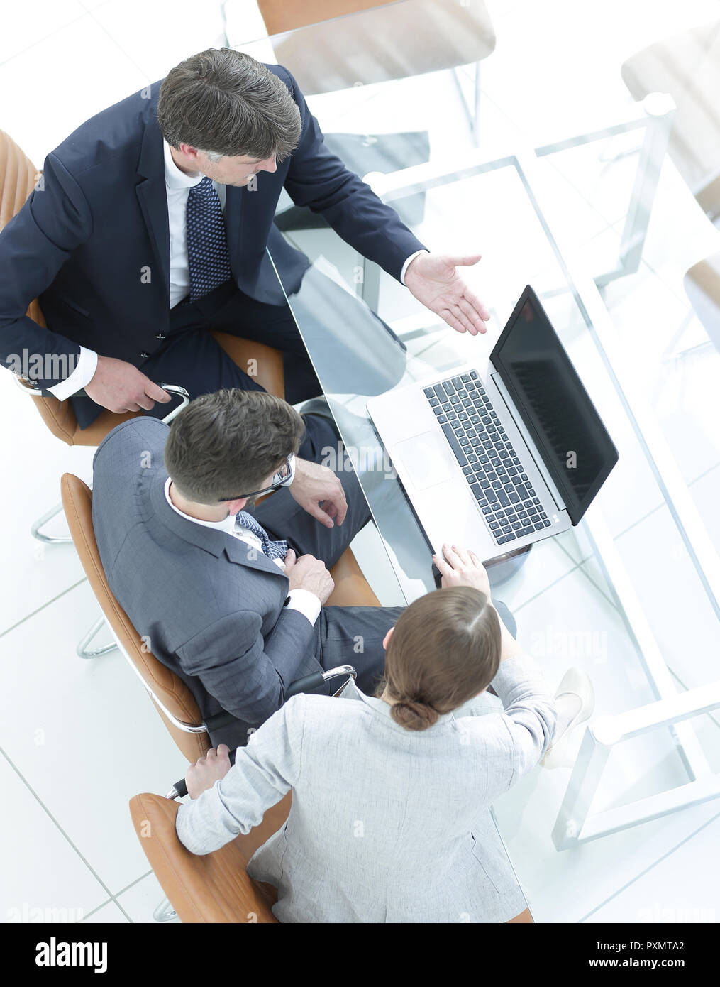 Business team working with laptop at work desk Stock Photo - Alamy