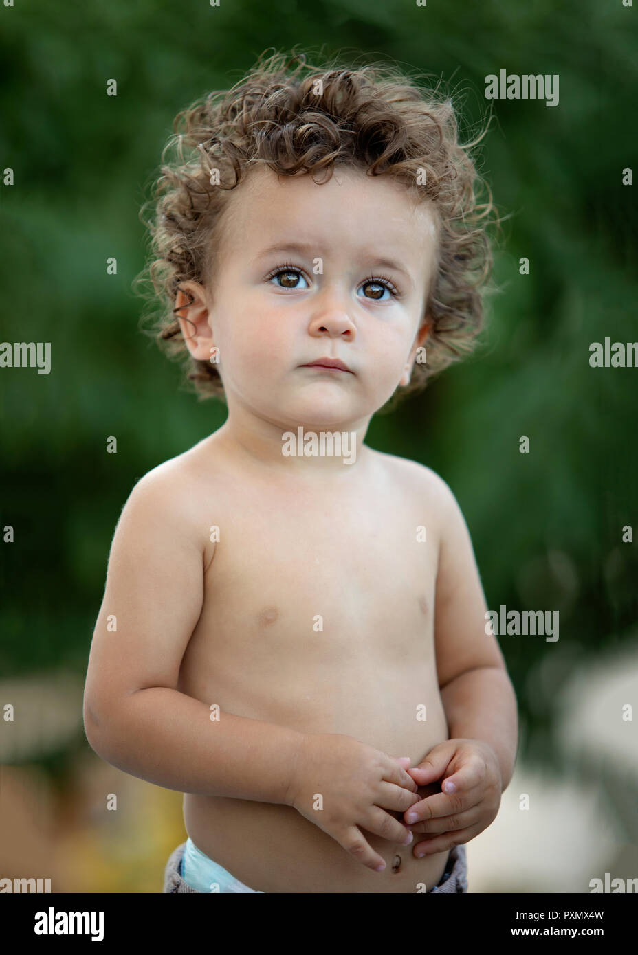 Cute Baby Boy With Curly Hair