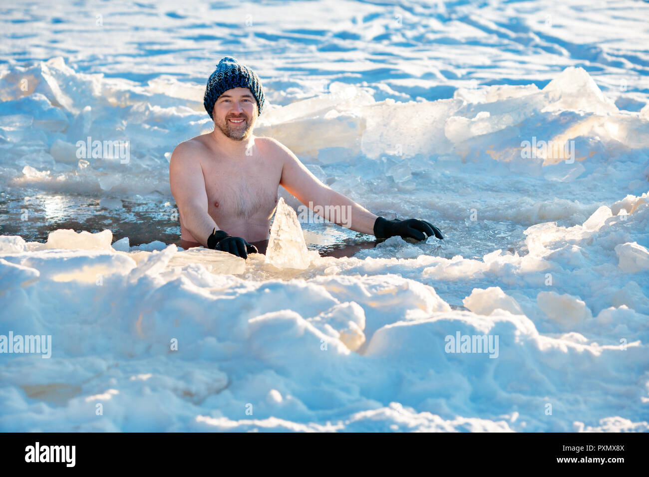 Ice hole swimming man hi-res stock photography and images - Alamy